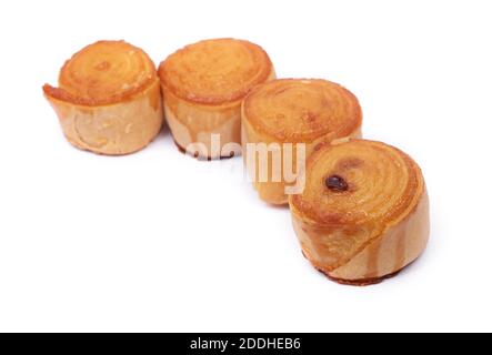 Group of rolled pastries isolated over white background Stock Photo - Alamy