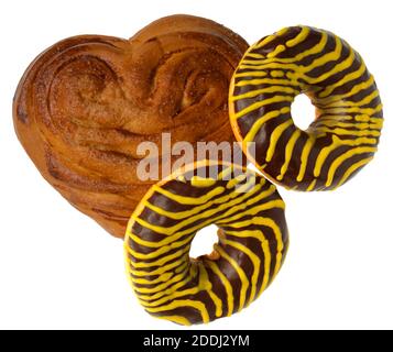 Appetizing American donuts and other pastries on white plate isolated ...
