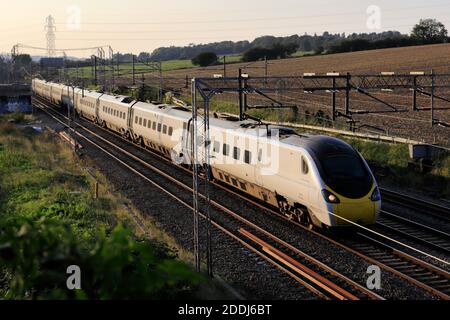 Class 390 Pendolino train Avanti West Coast livery passing Carnforth on ...
