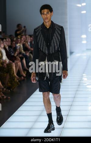 A model walks the runway during the Azzaro Haute Couture Fall/Winter ...
