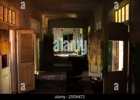Dark dirty corridor of old abandoned building Stock Photo - Alamy