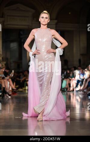 A model walks at the Rami Kadi Show during Paris Fashion Week Haute ...