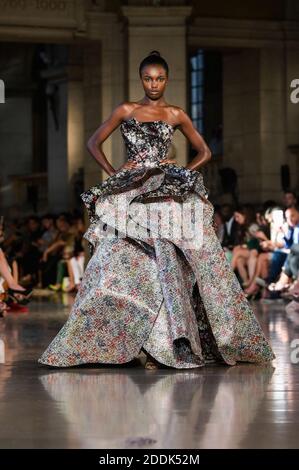 A model walks at the Rami Kadi Show during Paris Fashion Week Haute ...