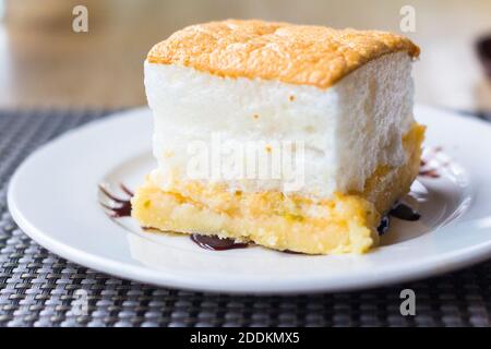 A slice of brazo de mercedes, a traditional Filipino dessert made of ...