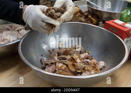 man prepares a Thanksgiving turkey for Thanksgiving dinner model ...
