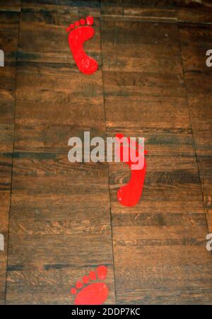 Cut out footprints, barefoot symbol Stock Photo - Alamy