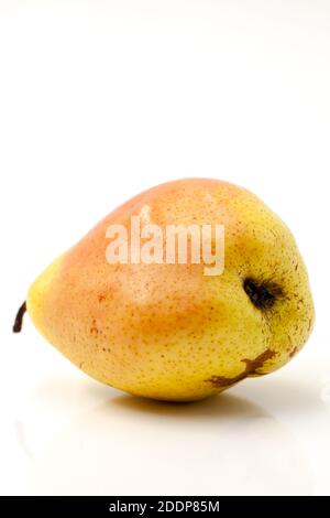 Fruit fresh pear with an imperfect shape. Selective focus with shallow ...