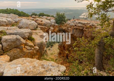 Sunset view of the Keshet Cave, a limestone archway spanning the ...