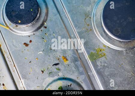 Dirty stove top with oil splatters, fat stains and food leftovers ...
