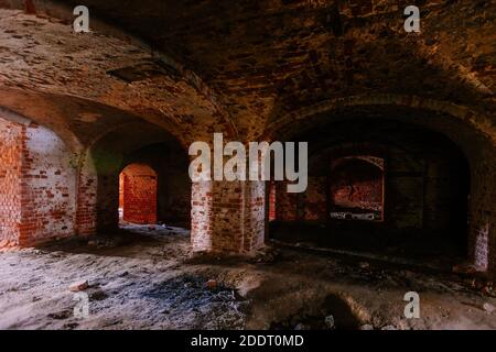 Dark and creepy vaulted red brick dungeon Stock Photo - Alamy