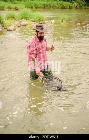 Fishin Addiction. summer weekend. Big game fishing. fisherman with ...