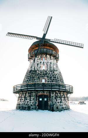 Low angle shot of a windmill on the hill in Mykonos, Greece Stock Photo ...