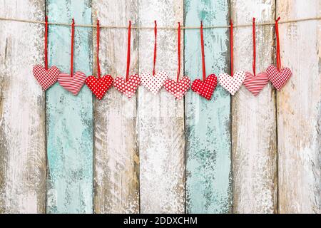 Red textile hearts on wooden sticks closeup. Valentines day background ...