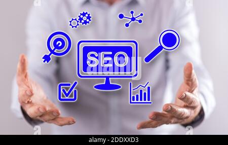 Seo concept above the hands of a man Stock Photo - Alamy