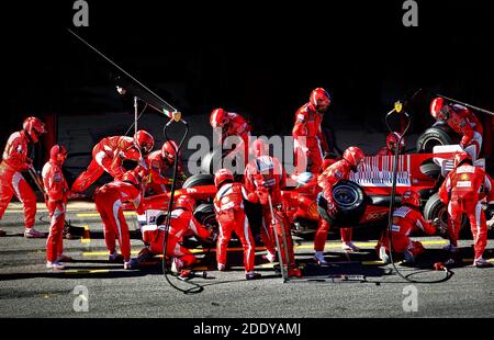 Ferrari Formula One Pit crew sit in Garage and wait for Pit stop Stock ...