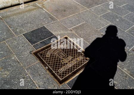 Street lighting manhole cover in Los Angeles. High voltage electricity ...