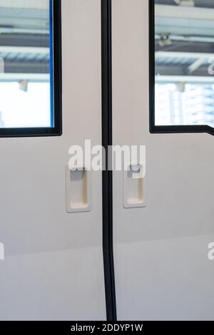 MRT Skytrain door with window, Bangkok, Thailand Stock Photo - Alamy