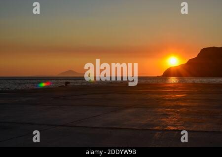 Sunset from Anafi's port Stock Photo - Alamy