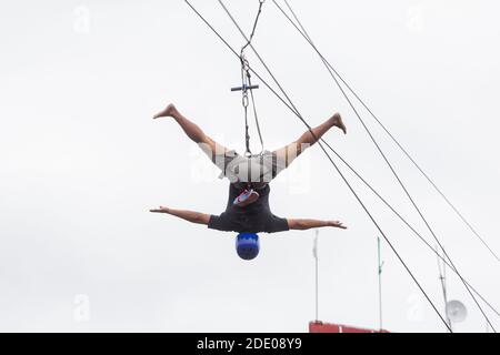 A Filipino man zip lining in Bicol, Philippines Stock Photo - Alamy