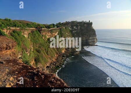 Limestone cliffs at Uluwatu Bukit peninsula, Bali Indonesia Stock Photo ...