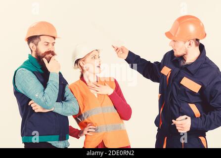 Builders and engineer arguing, misunderstanding. Team of architects ...