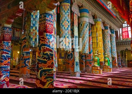Inside a praying hall in Drepung Monastery, one of the great three ...