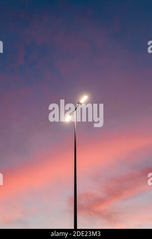streetlight and sky with clouds at sunset Stock Photo - Alamy