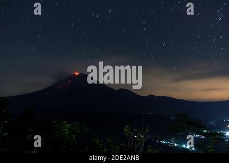 Mount Semeru at night, from a monitoring post in Sumber Mujur village ...