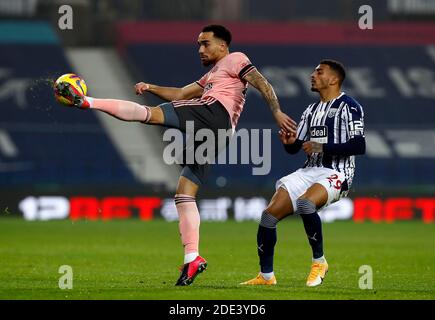 West Bromwich Albion's Karlan Ahearne-Grant (front) and Sheffield ...