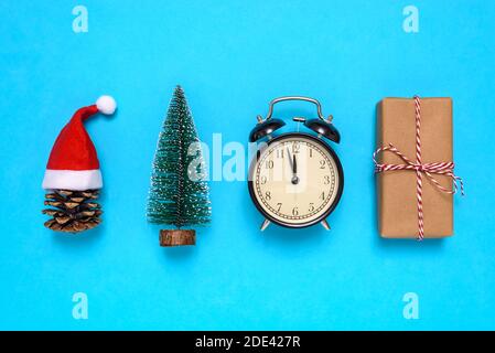 Small Christmas tree, alarm clock, books, presents and glowing lights ...