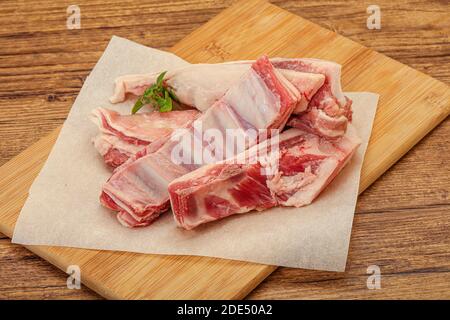 Raw lamb ribs served rosemary for cooking Stock Photo - Alamy