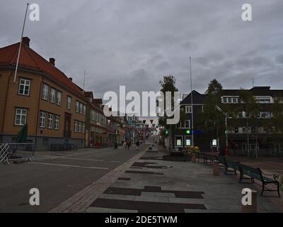 TROMSØ, NORWAY - People and shops on Storgata street, in central ...