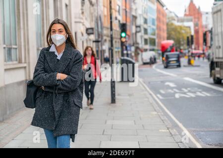 LONDON, ENGLAND - OCTOBER 23, 2020: Beautiful blonde woman wearing a ...