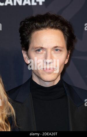 on the red carpet while arriving to the 44th Annual Cesar Film Awards ...