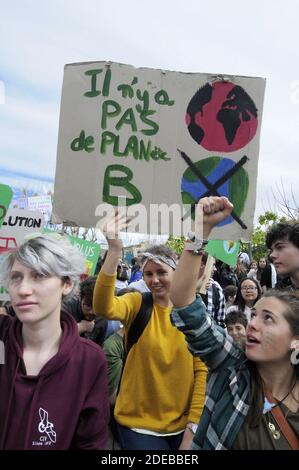 Youth hold banners during a demonstration against climate change on ...