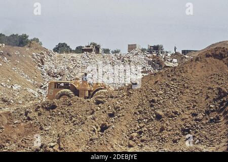 1970s Photo (1972) - City sanitary landfill operation. When filled this ...