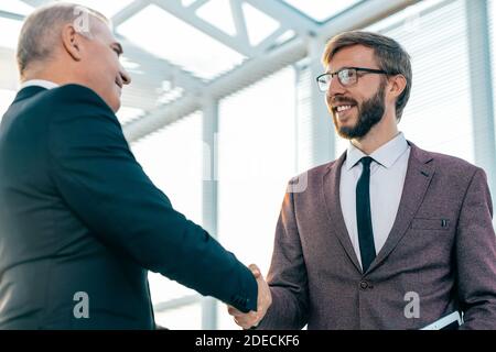 business people shaking hands firmly. concept of cooperation Stock ...