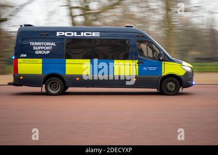 Territorial Support Group TSG Police vehicles responding to emergency ...