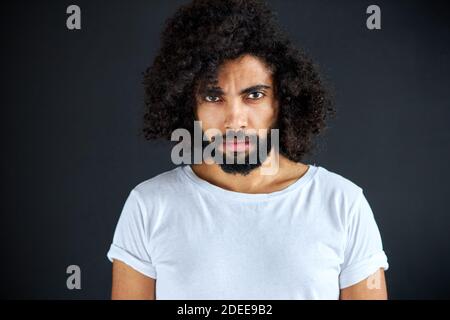 Male model in Arab Qatari dress on isolated background. Portrait of ...