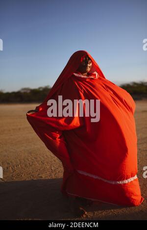 Wayuu indigenous woman wearing traditional red costume, La Guajira ...