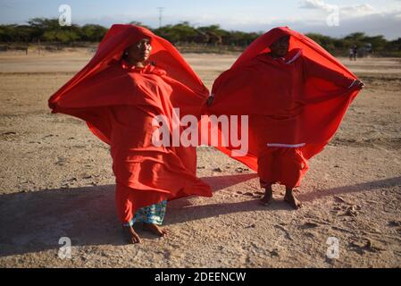 Wayuu indigenous woman wearing traditional red costume, La Guajira ...