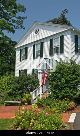 Front exterior of new white clapboard house with tuck under garage on ...