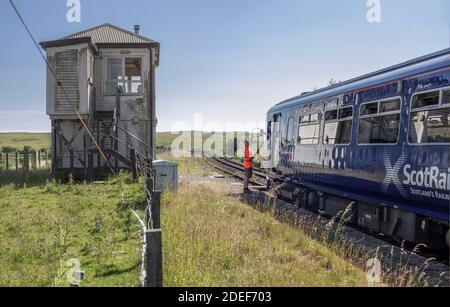 Glenwhilly Network Rail signaller exchanging single line tokens with ...