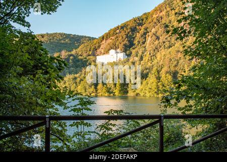 skyline of Monticchio lake in the sunset. It is an amazing lake with ...
