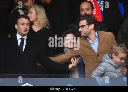 France's President Emmanuel Macron and his brother Laurent Macron and ...