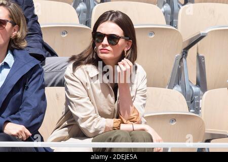 Actress Emma Margaret Tachard-Mackey stands during French Tennis Open ...