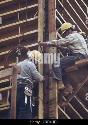 AT WORK ON PIERS FOR NEW BRIDGE THAT WILL CROSS THE BALTIMORE HARBOR AT ...