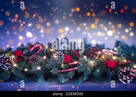 Christmas garland on dark background Stock Photo - Alamy