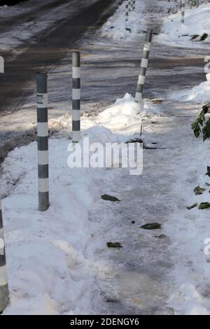 Uncleaned from snow, icy sidewalk Stock Photo - Alamy