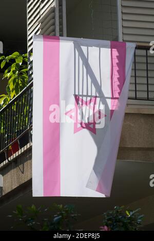 Pink version of the Israeli flag, hanged from a balcony in the city of ...